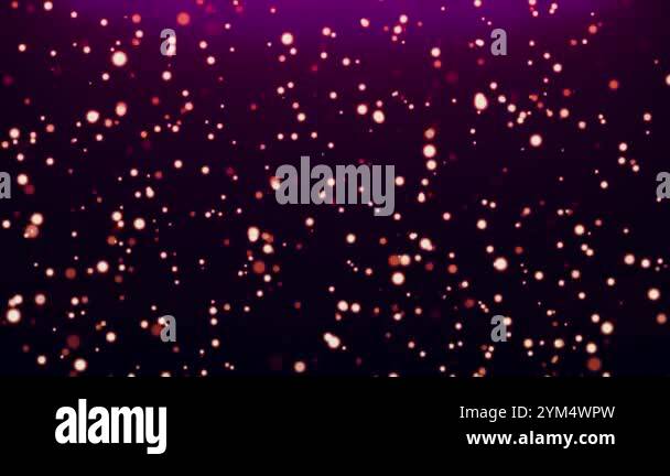 Dynamic holiday background of falling glowing particles on dark purple ...