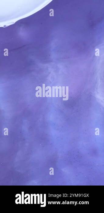 Watch as vibrant alcohol inks blend together to create an abstract ...