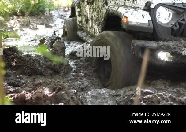 Wheels spinning in mud Stock Videos & Footage - HD and 4K Video Clips ...