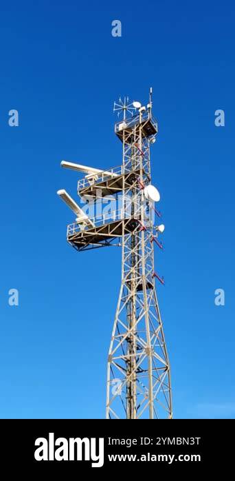 Marine radars on the mast. Antennas and rotating radars on the high ...