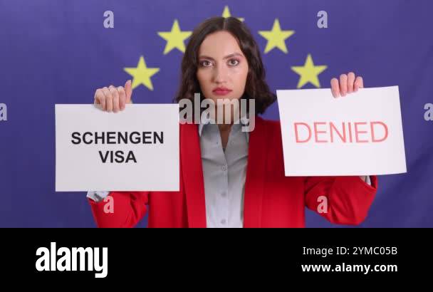 Sad woman shows cards with words SCHENGEN VISA and DENIED against ...