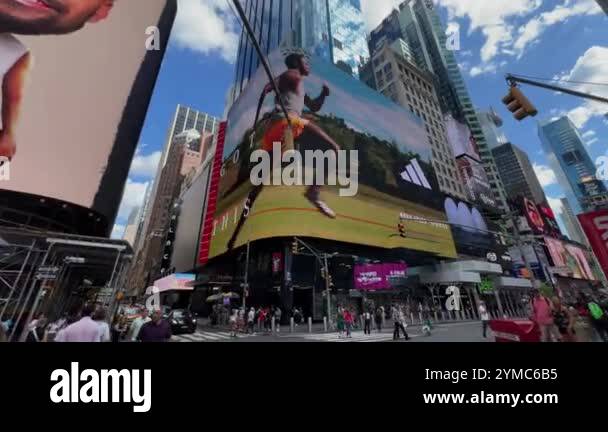 NEW YORK, USA - AUGUST 15, 2024: A vibrant and bustling view of Times ...