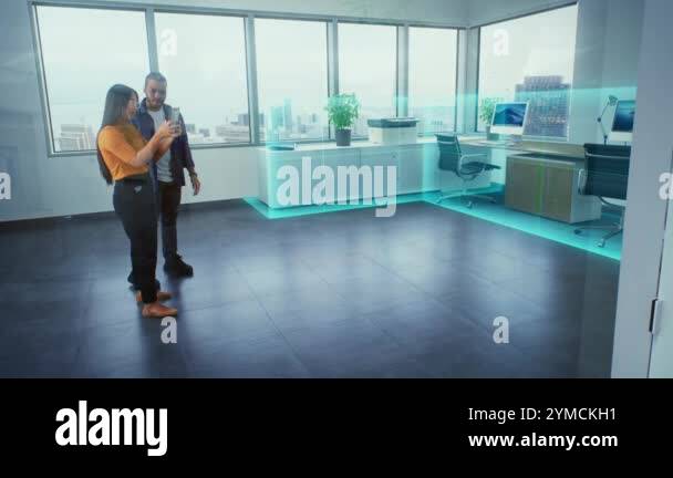 Diverse team of creative designers uses digital tablet computer and ...