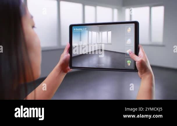 Asian female designer uses tablet computer and augmented reality ...