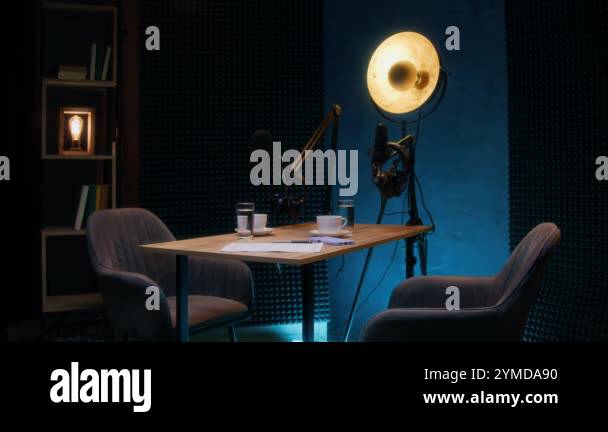 Full no people shot of podcast studio set up for guest interview before ...