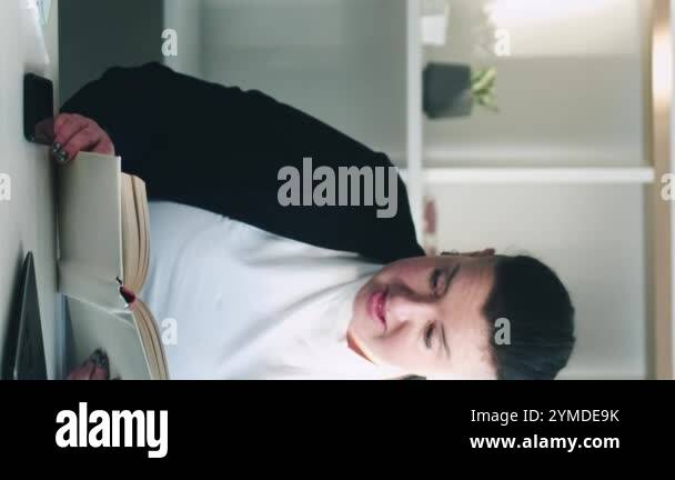 Vertical video. Working routine. Bored employee. Tired female falling ...