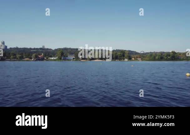 Rowing team training. Side view of 2 young caucasian male rowers ...