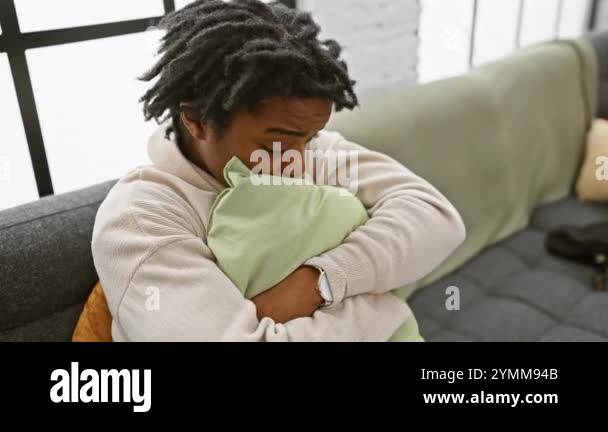 Stressed young black woman with dreadlocks expressing sadness, sitting ...
