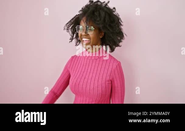 Furious african american woman in glasses, standing and unleashing a ...