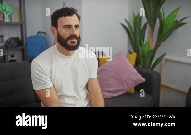 Astounded mature man at home, spotting something shocking forward ...