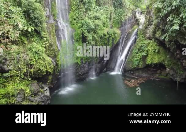 The drone view of Tebela Waterfall in Banyumas Regency, Central Java ...