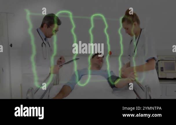 Doctors examining patient in hospital bed with green wave animation ...