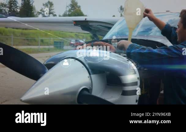 Pouring fuel into aircraft engine, network connections animation over ... Pouring fuel into aircraft engine, network connections animation over ...