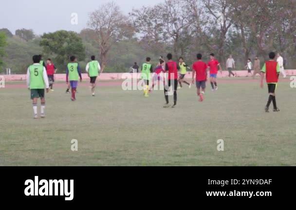 ISLAMABAD, PAKISTAN - May 05, 2017 - School kids playing soccer in the ...