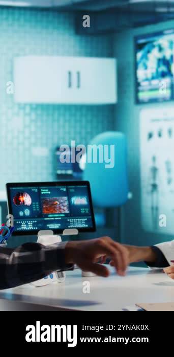 Vertical Video Healthcare professional uses oximeter to measure oxygen ...