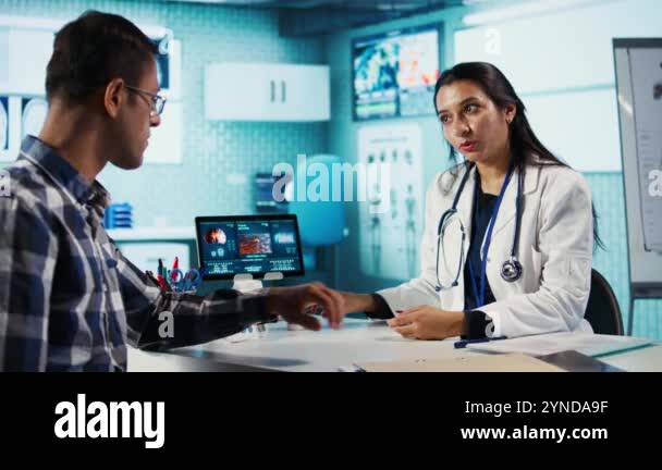 Healthcare professional uses oximeter to measure oxygen levels for patient at check up ...