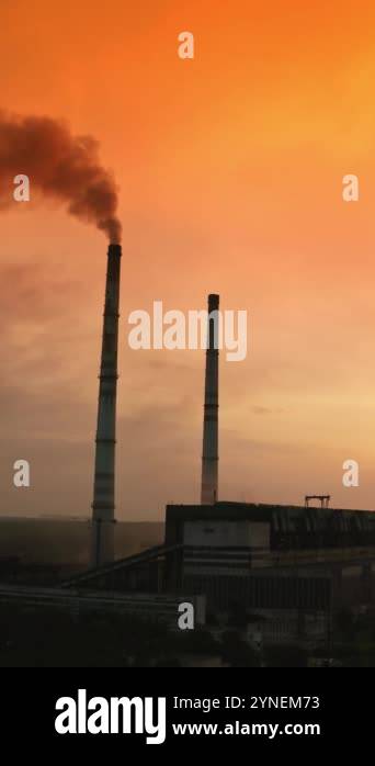 Environmental poisoning by chemical industry. Factory chimneys are ...
