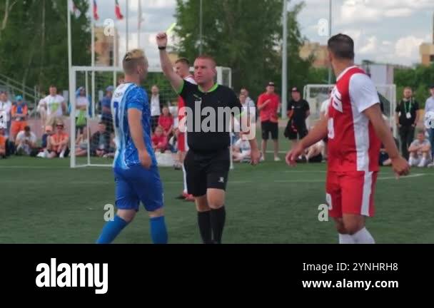 ALMATY, KAZAKHSTAN - AUGUST 19 2024: Professional man referee raises ...