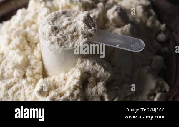 Measuring spoon with dry protein, sports supplement for health and ...