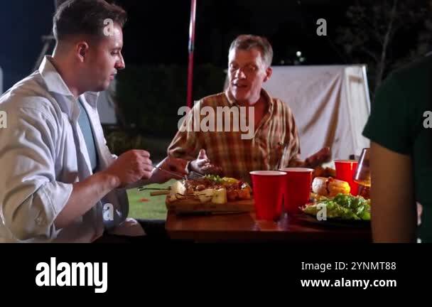 Family gather celebrate holiday. Parents and grandparents together talk ...
