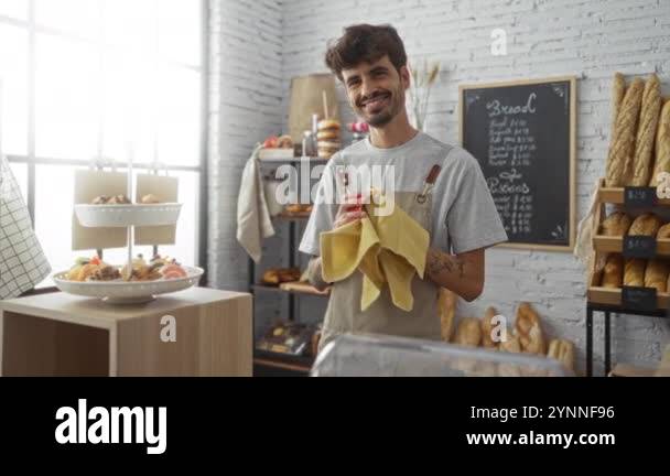 Hispanic baker cleaning tray Stock Videos & Footage - HD and 4K Video ...