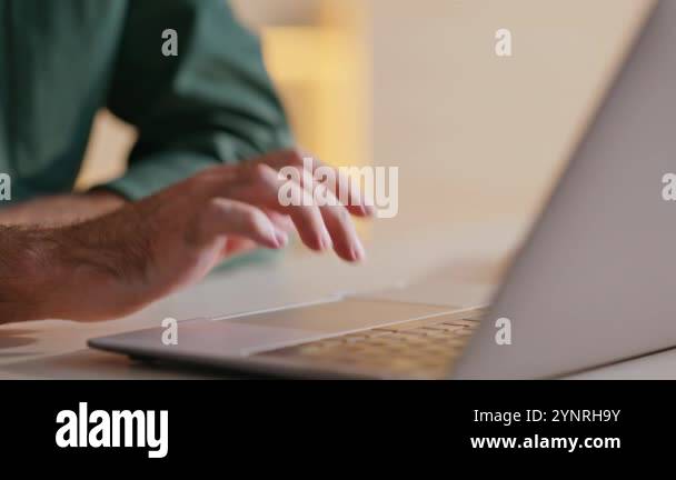 Man fingers tapping touchpad laptop creating program code closeup ... Man fingers tapping touchpad laptop creating program code closeup ...