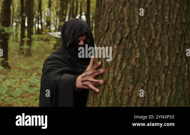 Mysterious figure in hooded Stock Videos & Footage - HD and 4K Video ...
