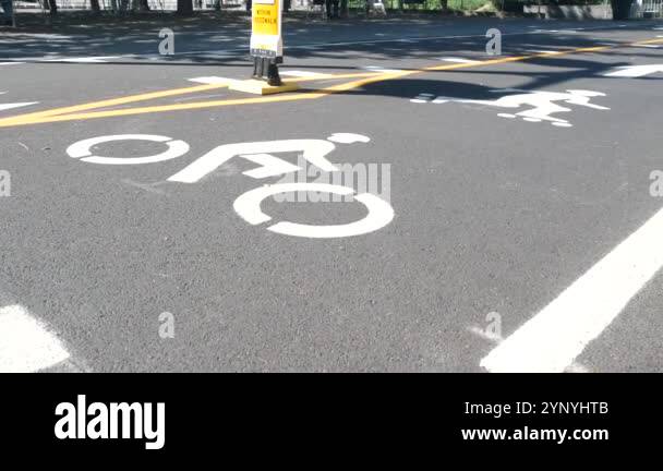 Bike lane asphalt sign, New York City. Bicycle path, cycle route for ...
