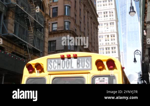 Yellow School Bus. Schoolbus back view on Fulton street, New York City ...