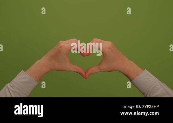Two hands coming together to form beautiful heart shapes, symbolizing ...