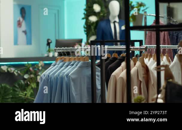 Contemporary fashion display in an empty retail store with a variety of ...