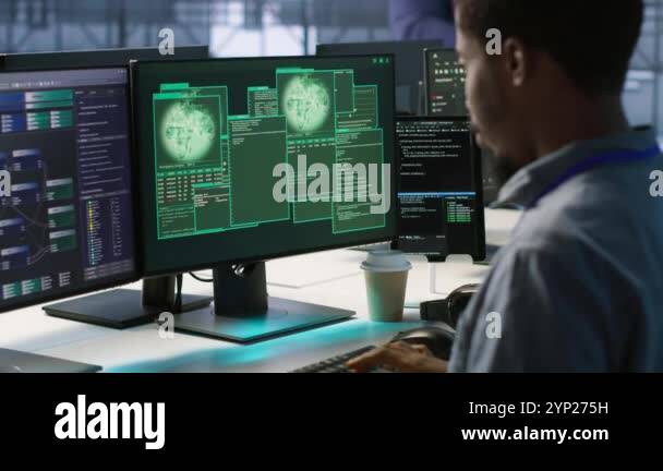 Engineers Seeing System Hacked Popup On Pc Screen In Data Center