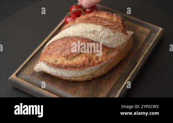 Homemade fresh crispy wholemeal bread on dark concrete background Stock ...