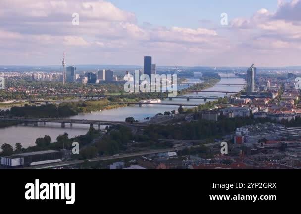 Urban sprawl intertwines with nature as the Danube River flows through ...