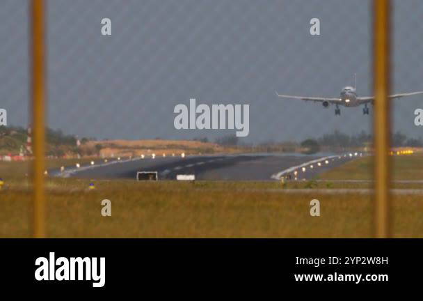 Slow motion footage of an airplane with an unrecognizable livery ...