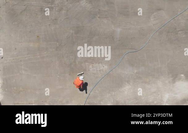 Watch as the foundation takes shape with concrete pouring and formwork ...