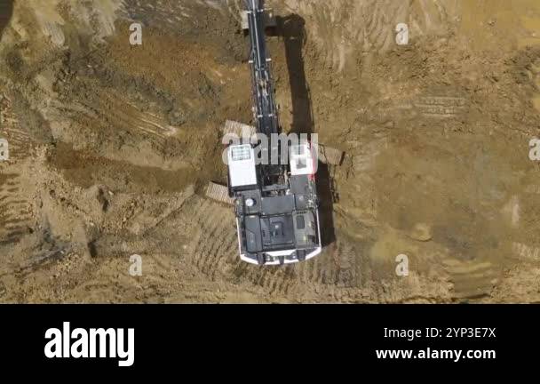 Watch early construction as heavy machines lay foundations, pouring ...