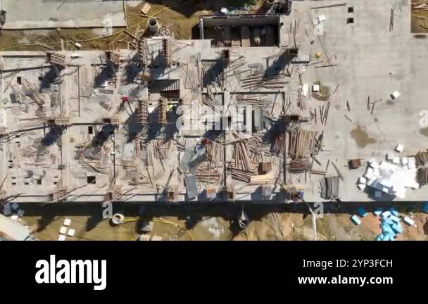 Watch the construction crew bend rebar and pour concrete, building the ...