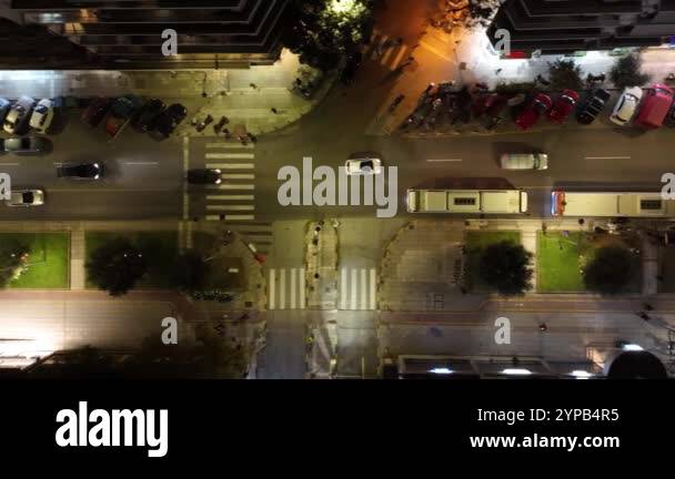 In the heart of Thessaloniki, the bustling night scene showcases busy ...