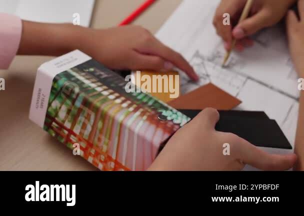 Skilled interior designer using architectural equipment draw blueprint ...