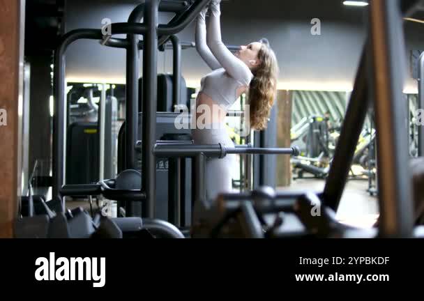 Teenage girl taking a break from boxing in gym. Teen girl tired in the ...