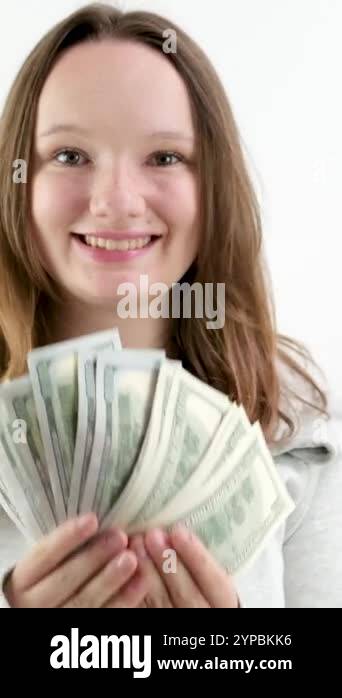 oh happy young teenage girl waving money like a fan 100 dollar bills ...