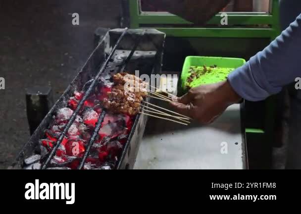 Process Grill Sate or Chicken satay, satay grilled on burning charcoal ...