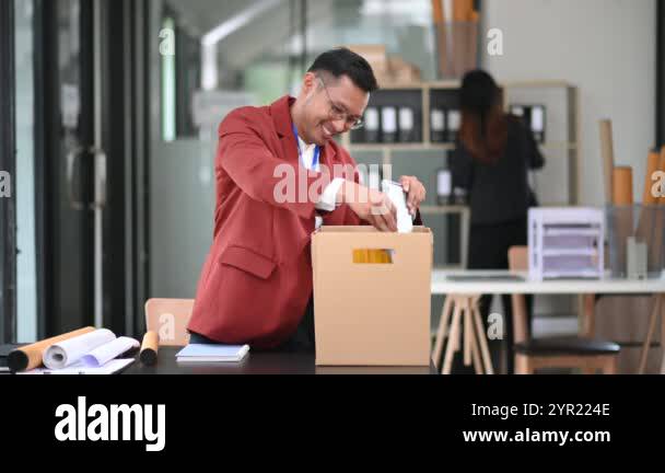 Happy and excited young Asian man office worker celebrating his ...