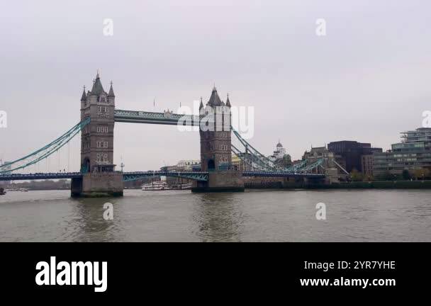 Tower Bridge stands tall over the River Thames, its iconic design and ...