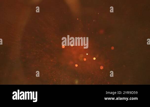 Tiny sparks randomly flying from top in the air, empty space template ...