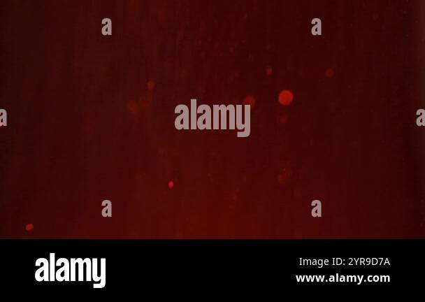 Tiny sparks randomly flying from top in the air, empty space template ...