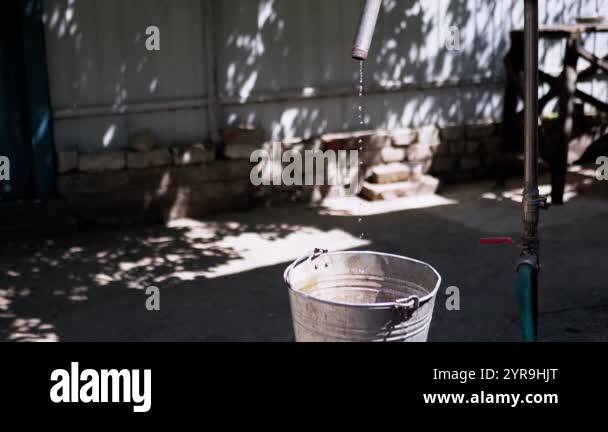 Water drip bucket Stock Videos & Footage - HD and 4K Video Clips - Alamy