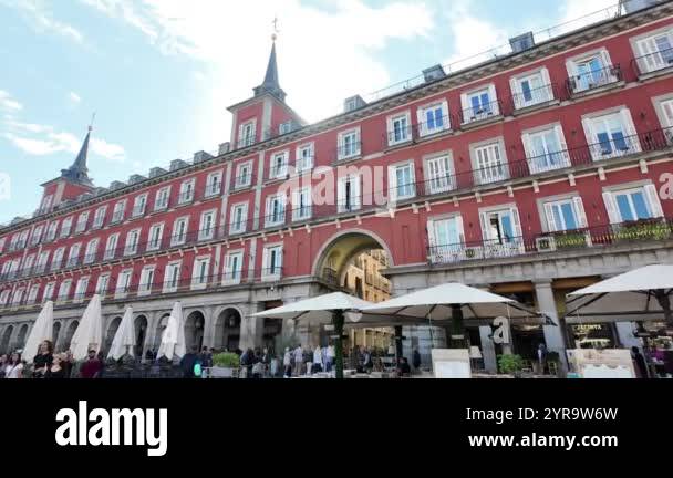 Capture the grandeur of Plaza Mayor with its iconic red brick ...