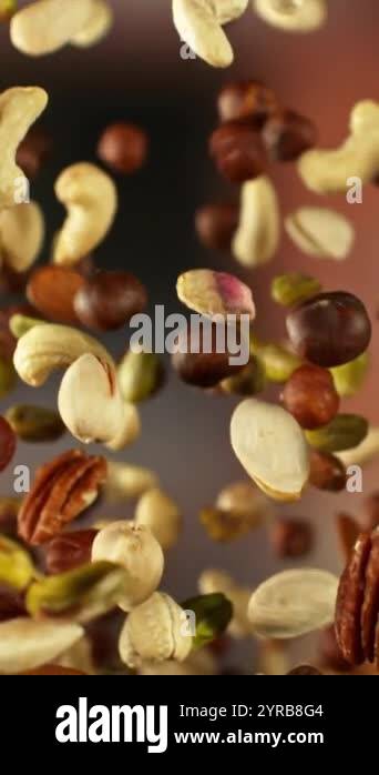 Super Slow Motion of Flying Nuts Mix. Abstract Blur Interior on ...